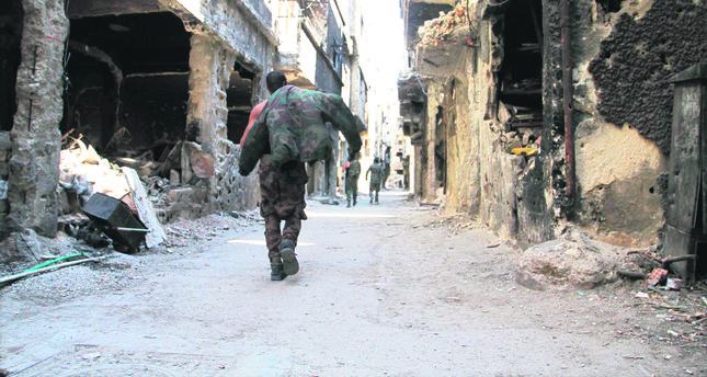 Palestinian refugees in Yarmouk face threat of massacre, UN warns ...