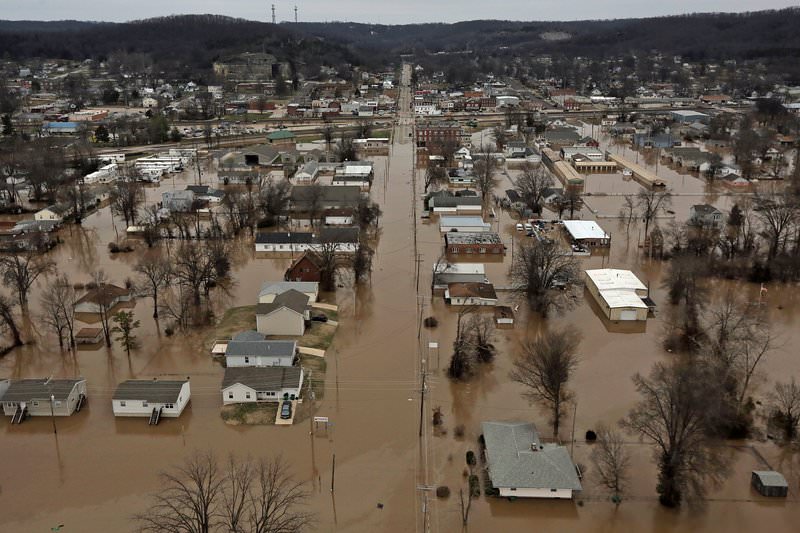 Deadly storms cause record flooding in US, prompting evacuations ...