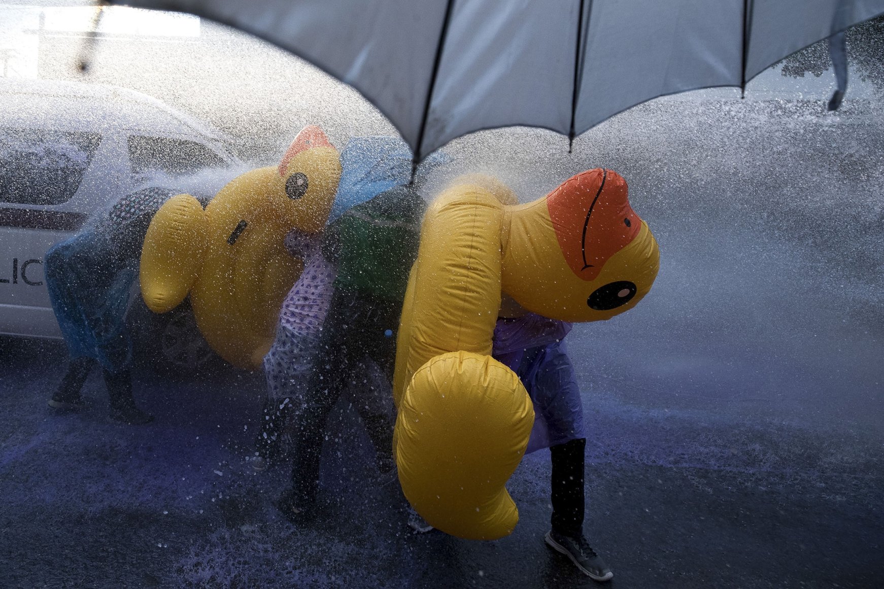 Thai protesters use inflatable ducks against water cannons | Daily Sabah