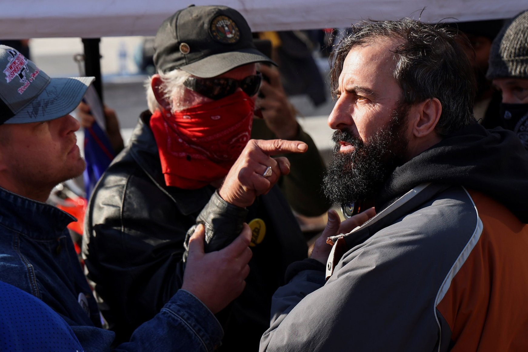 In photos: Opposing groups clash after pro-Trump protests decry ...