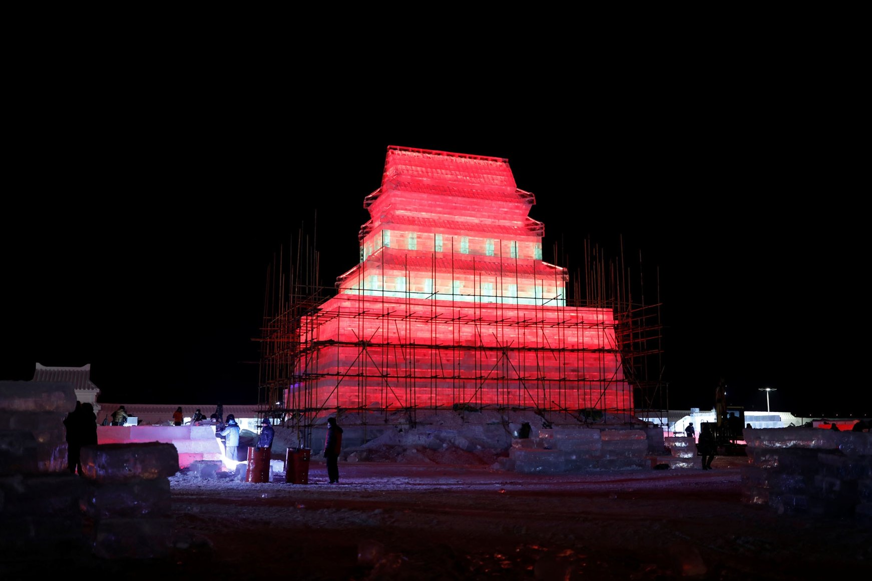 In photos: China's ice sculptors build frozen castles in the cold ...