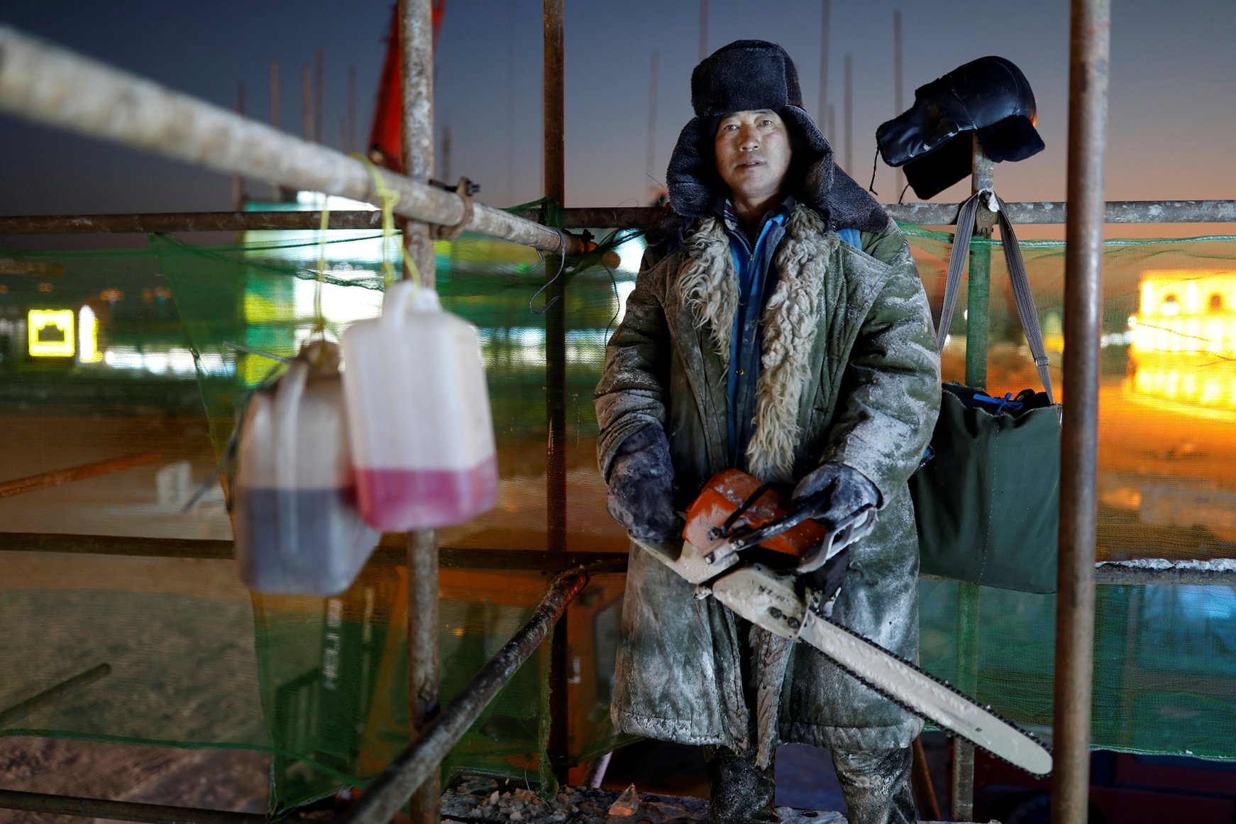 In photos: China's ice sculptors build frozen castles in the cold ...