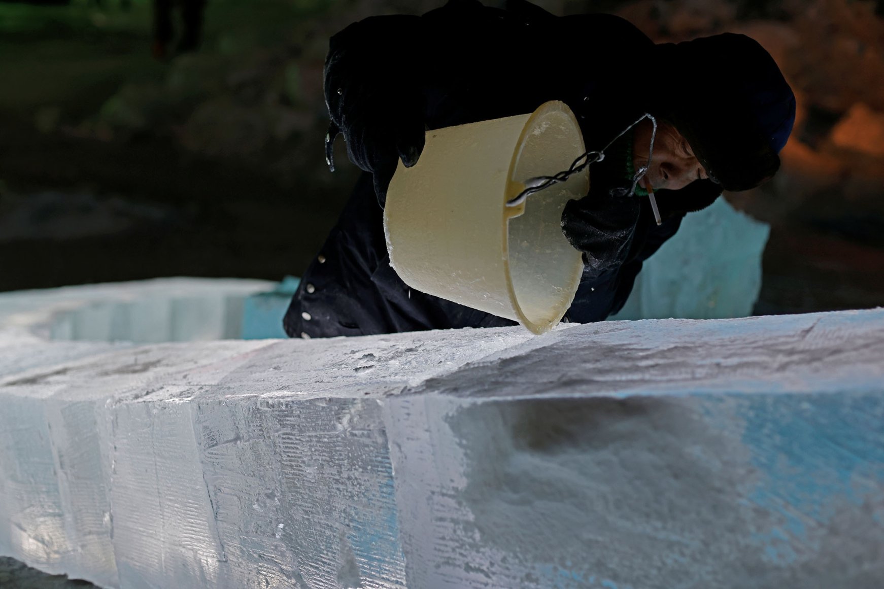 In photos: China's ice sculptors build frozen castles in the cold ...