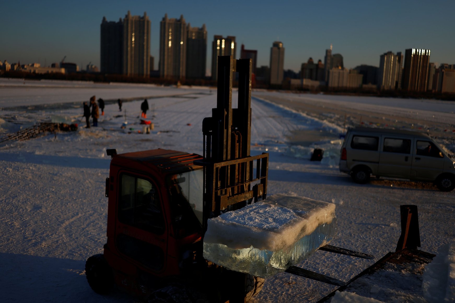 In photos: China's ice sculptors build frozen castles in the cold ...