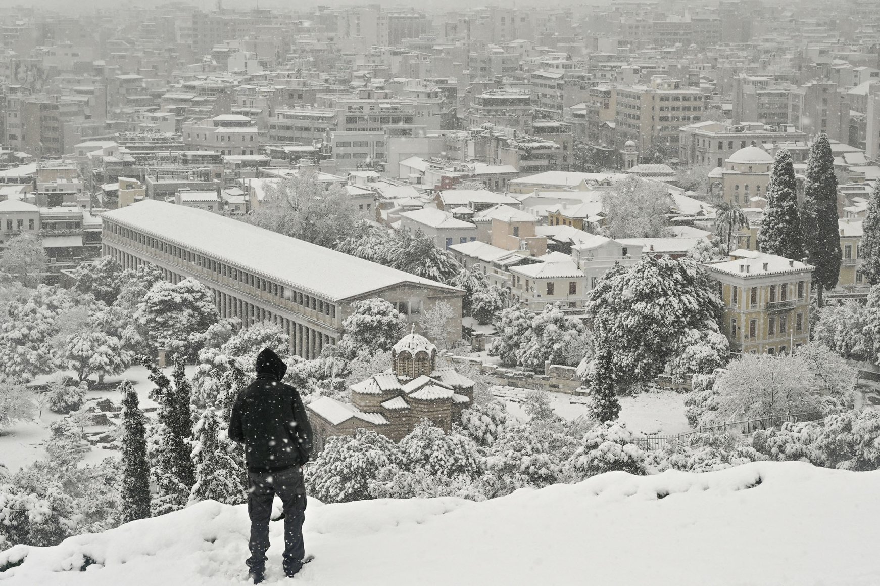 In photos: 3 dead as heaviest snowfall in over a decade hits Greece ...