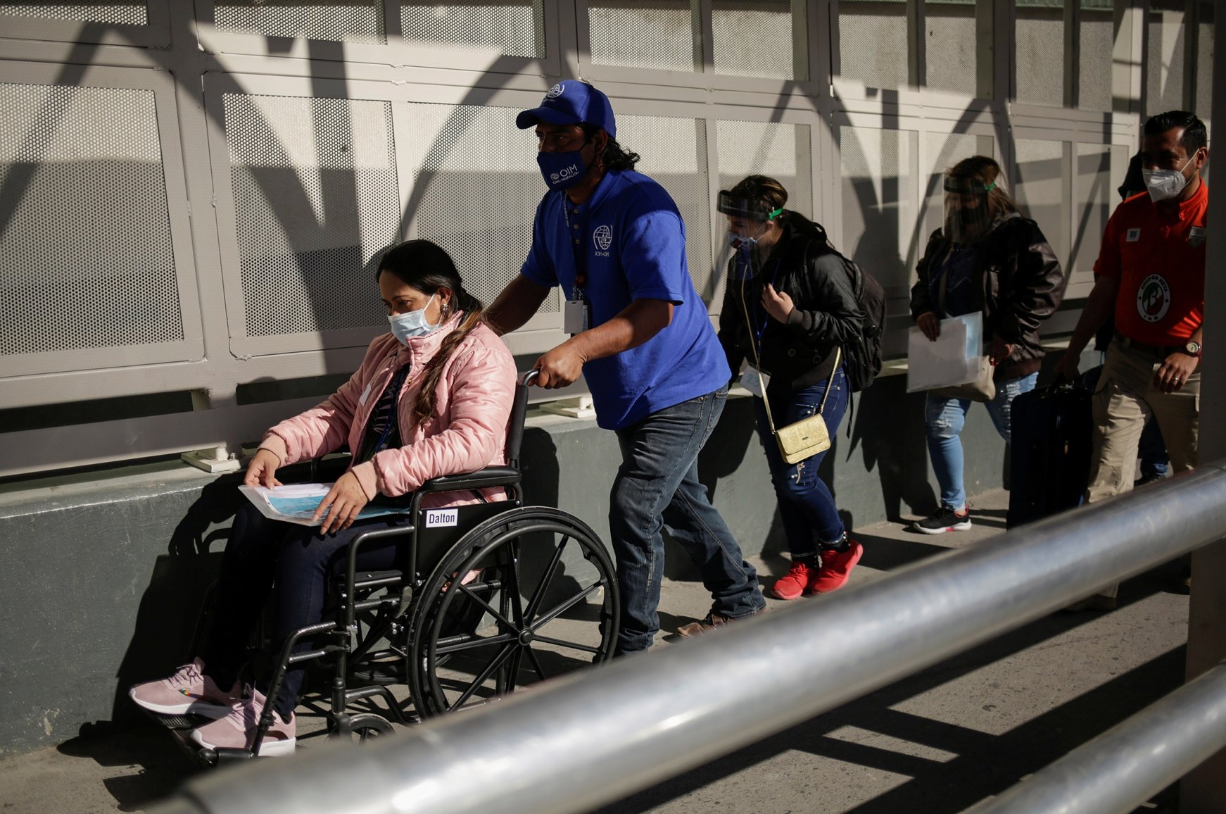 In photos: Asylum-seekers enter US under revamped Biden policy | Daily ...