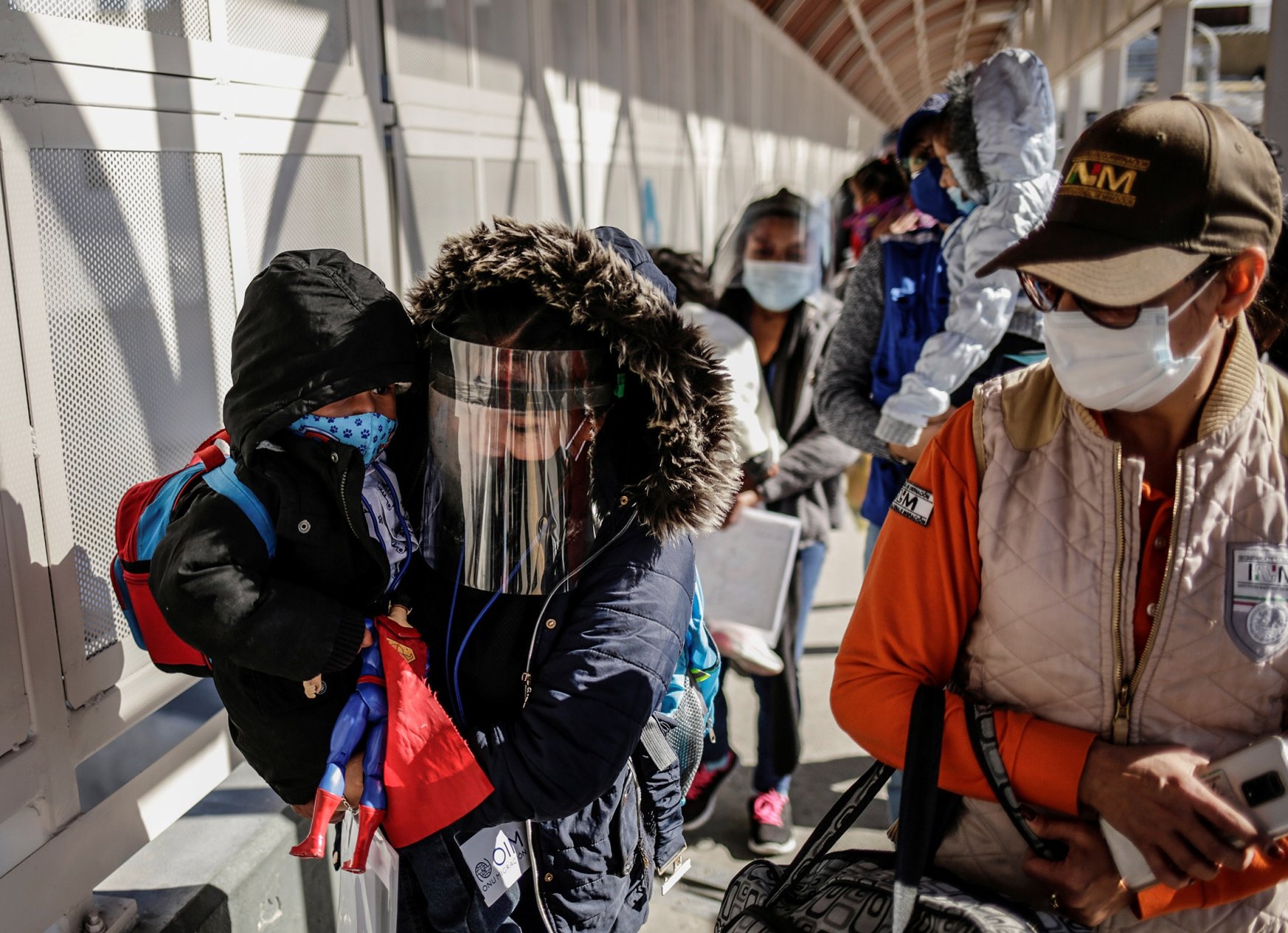 In photos: Asylum-seekers enter US under revamped Biden policy | Daily ...
