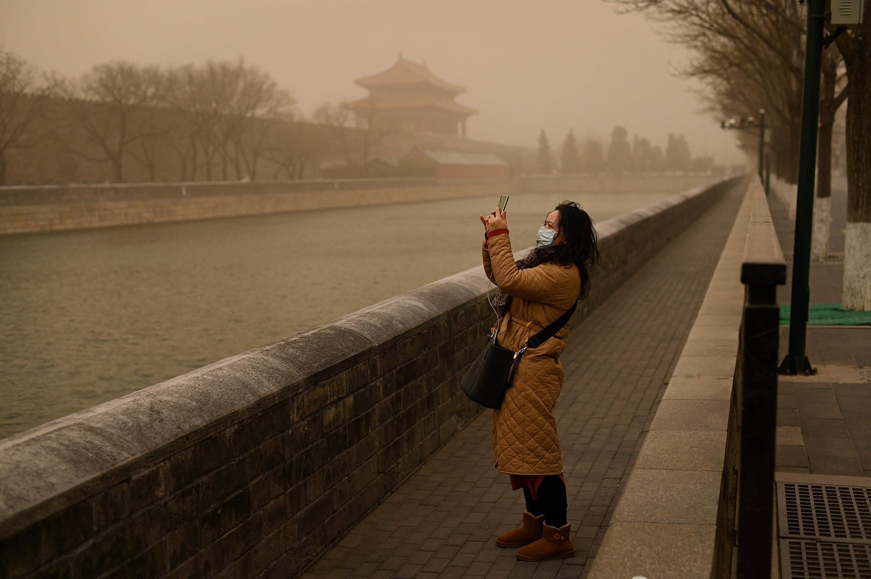 In photos: Biggest sandstorm in decade hits Beijing | Daily Sabah