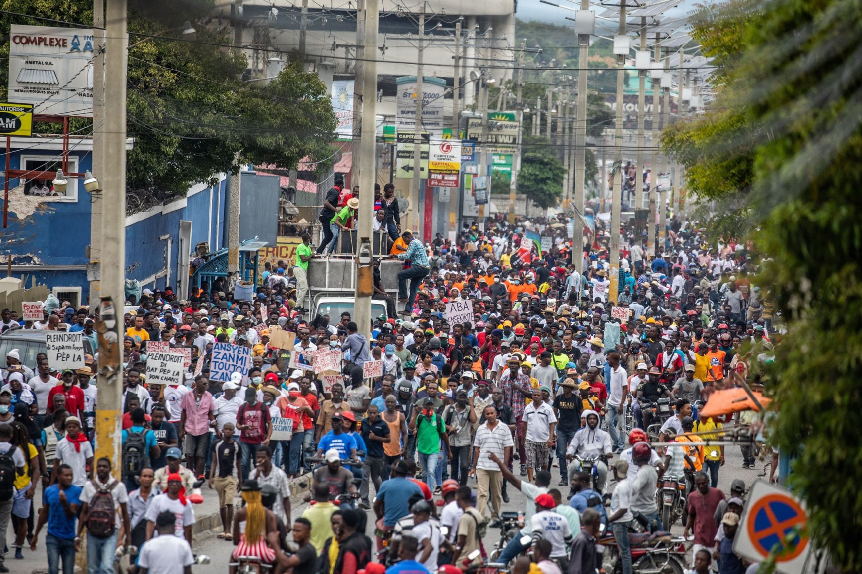 Barricades burnt as Haitians protest against gang violence, kidnappings ...