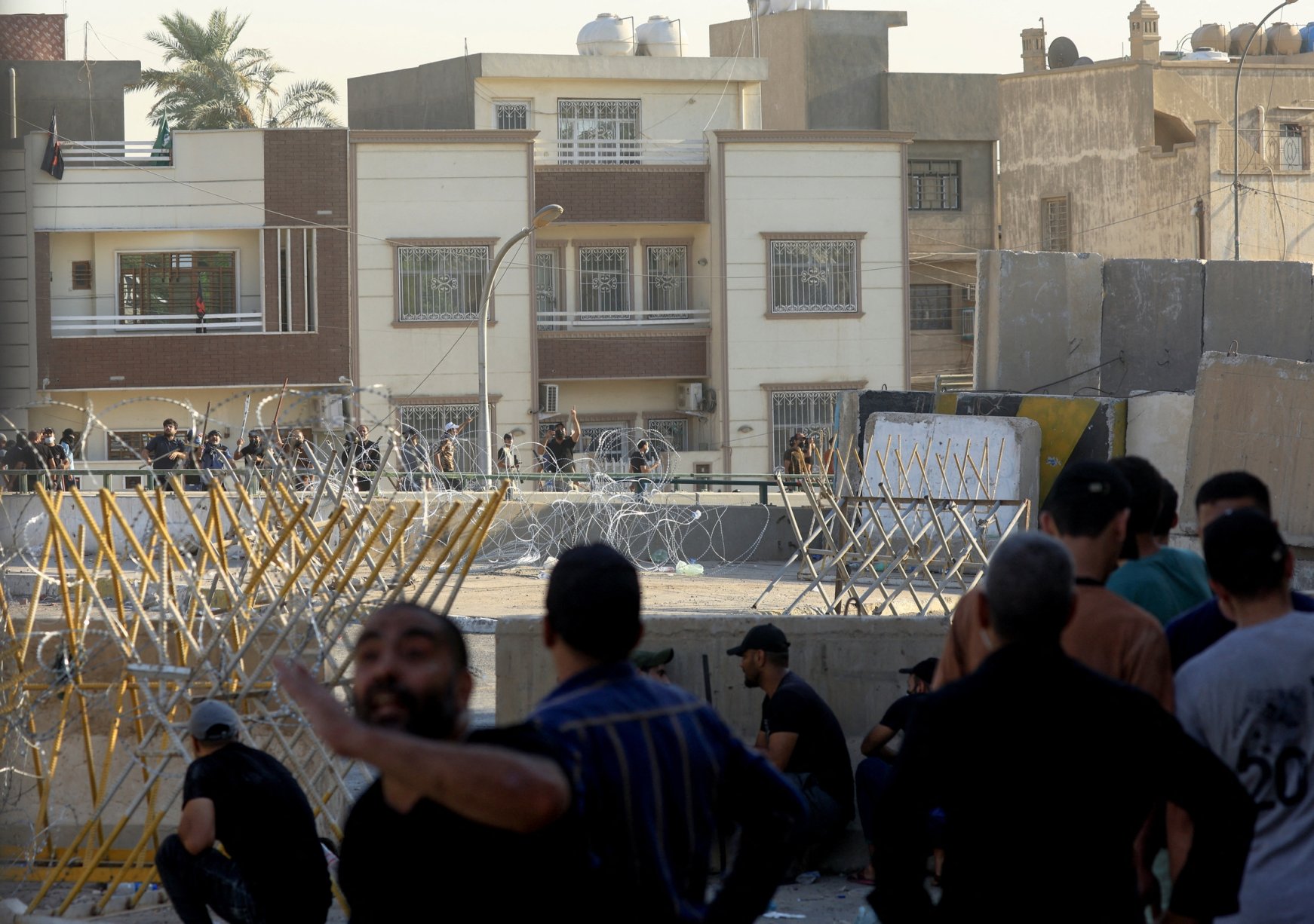 Storming of Baghdad's palace: Pro-Sadr protests and a quick swim ...
