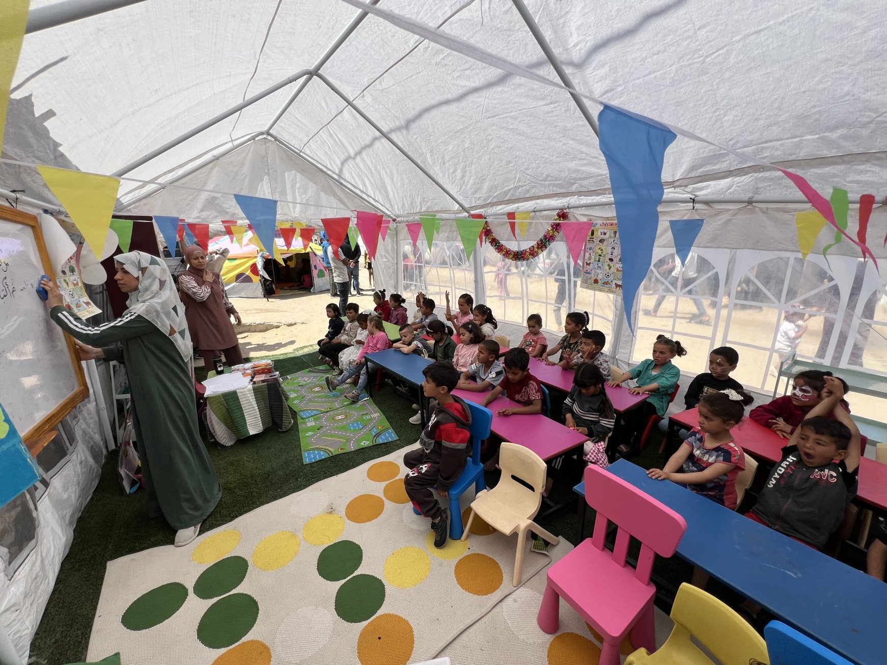 Tent schools in Gaza: Fighting for education in the shadow of war ...